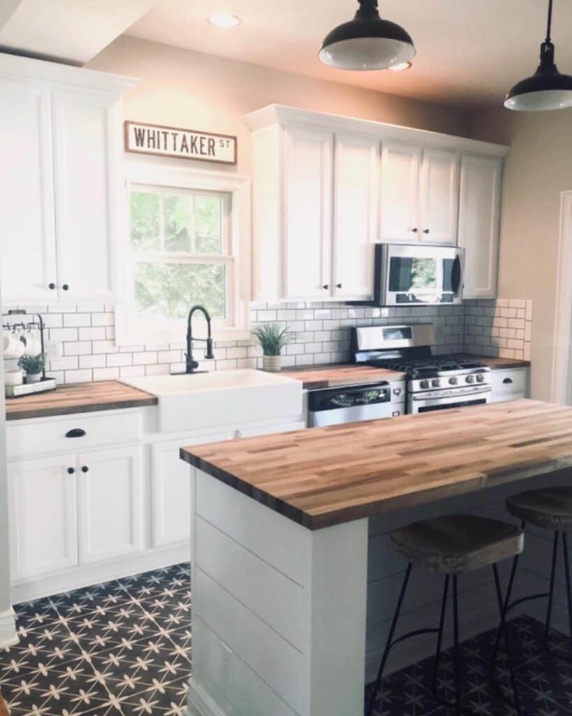 Farmhouse Kitchen With Black and White Patterned Tile Floor - Soul & Lane