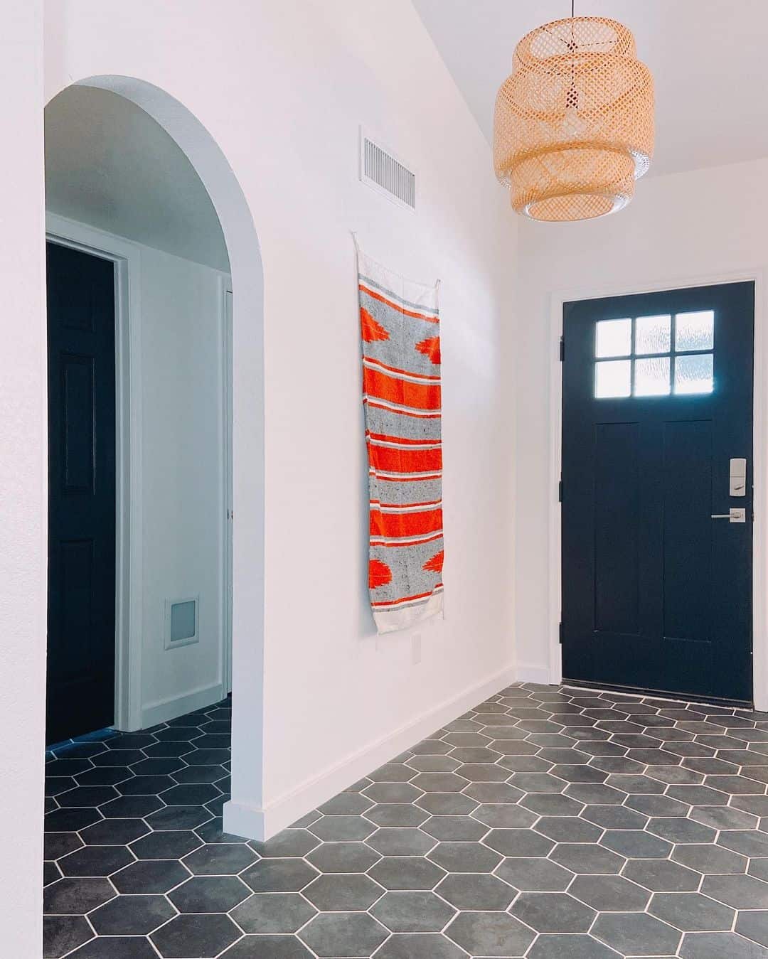Hexagon Tiles in Minimalist Entryway - Soul & Lane