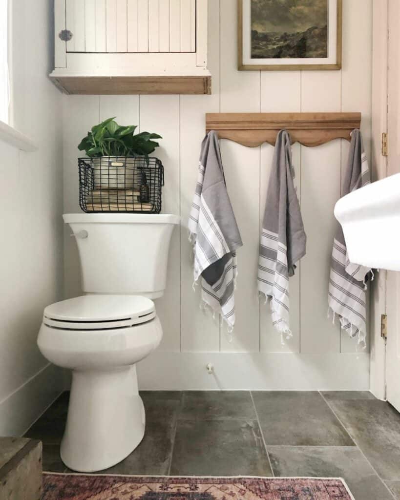 23 Fresh New Ways to Enhance Your Over Toilet Décor