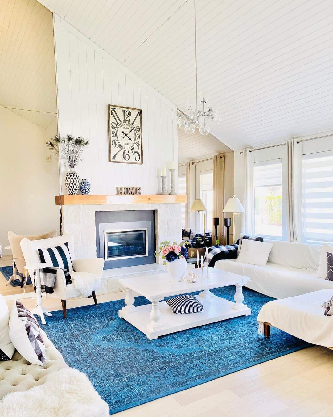 Gorgeous Blue Rug Brightens a White Living Room - Soul & Lane