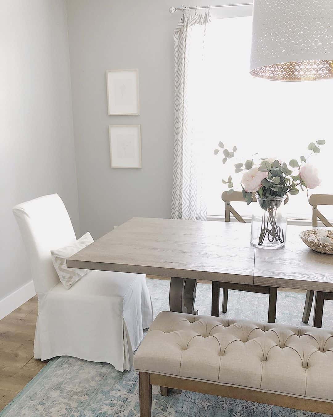 Light and Airy Farmhouse Dining Room With Upholstered Bench - Soul & Lane
