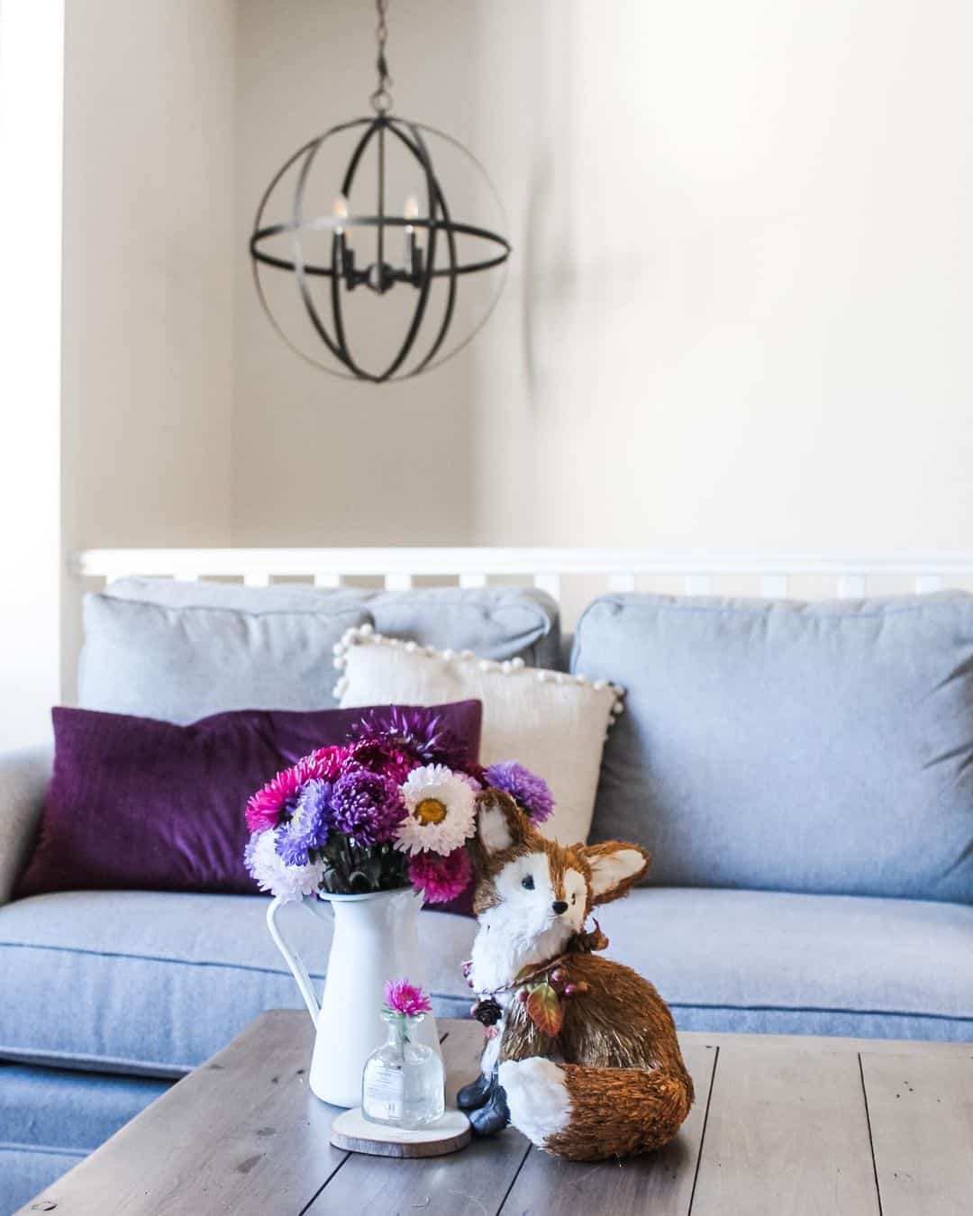 Modern Farmhouse Living Room With Flower Décor - Soul & Lane