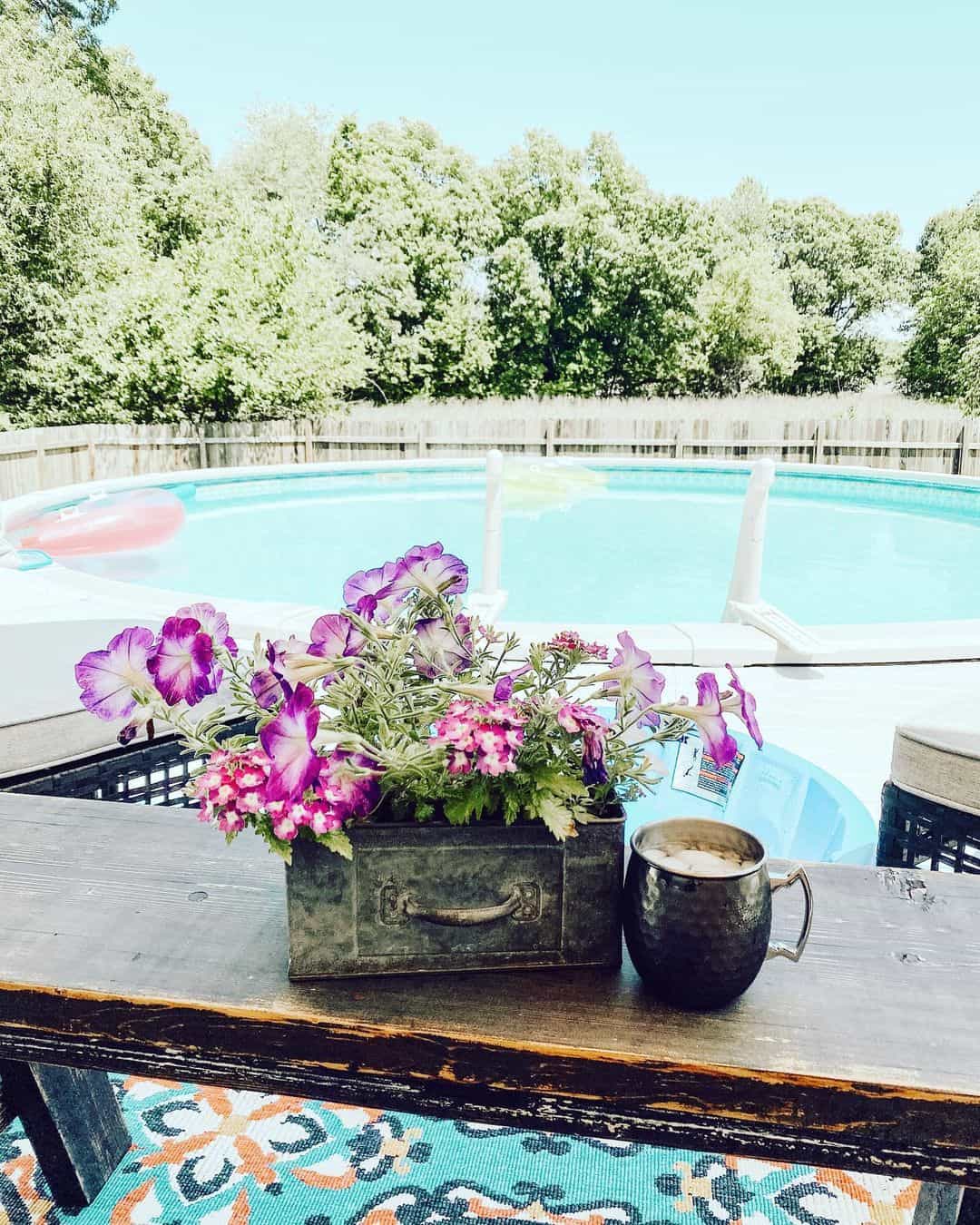 Vibrant Flowers Displayed in Distressed Planter - Soul & Lane