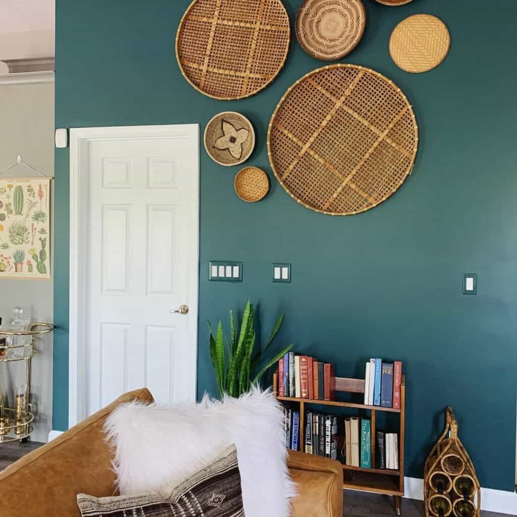 Deep Teal Accent Wall With Wicker Decor - Soul & Lane